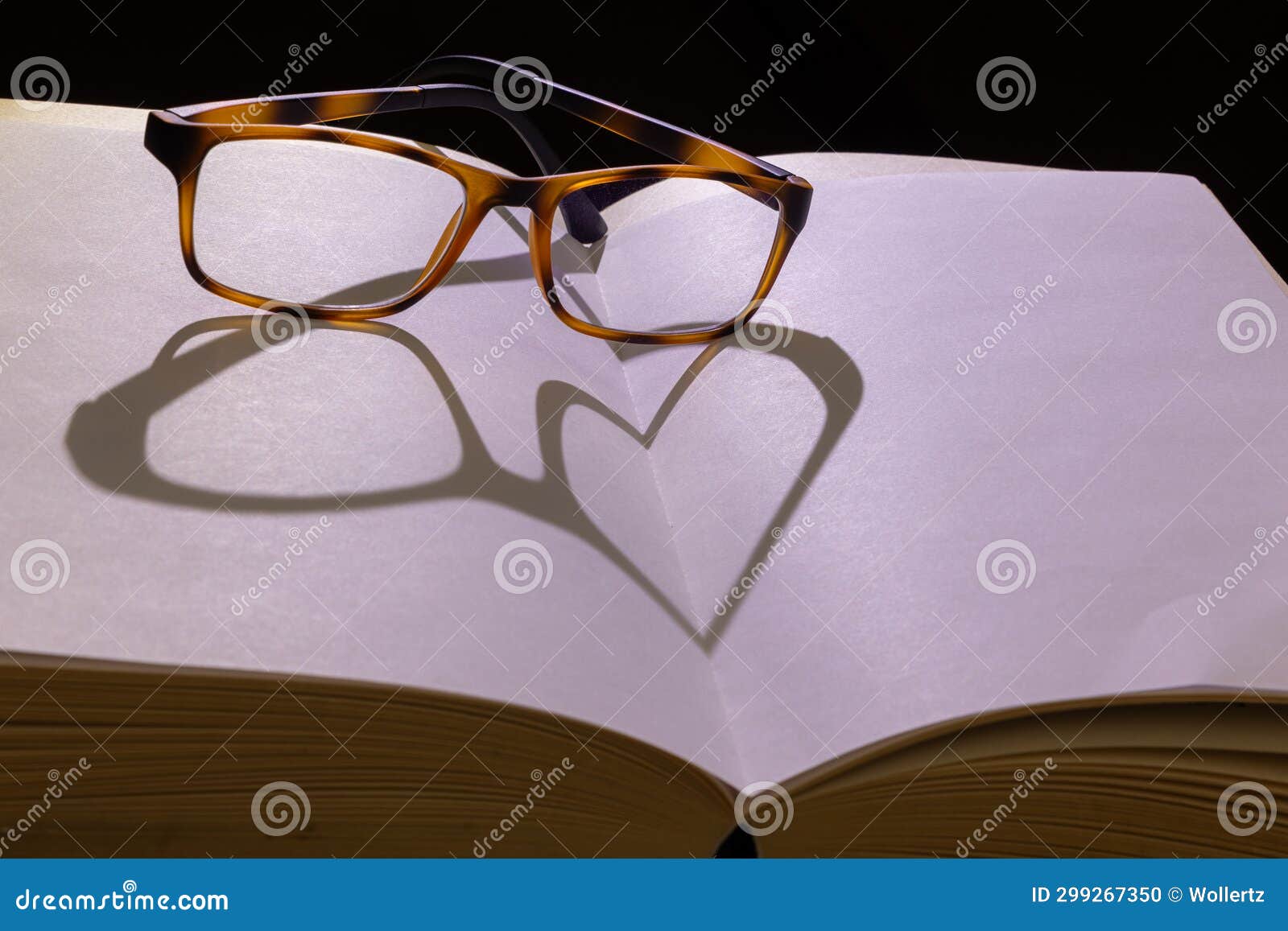 Heart Shaped Shadow from a Pair of Eye Glasses Stock Photo - Image of ...