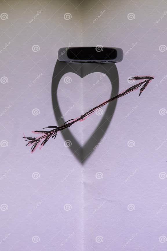 Heart Shaped Shadow from a Round Ring Stock Image - Image of marriage ...