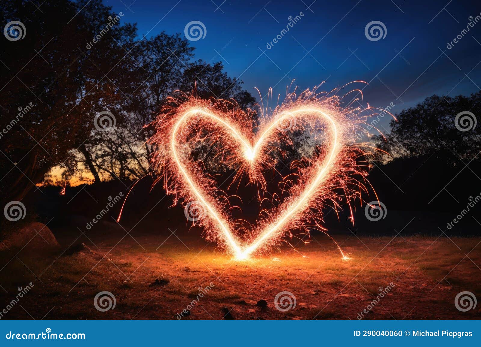 A Heart Shaped Sparkling Fireworks Showing Love and Romance Stock Photo ...