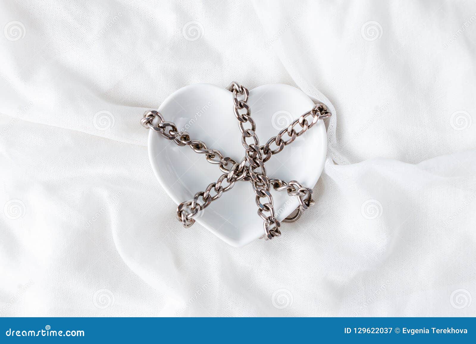 The Heart Symbol in Chains, on a Light Background Stock Image - Image ...