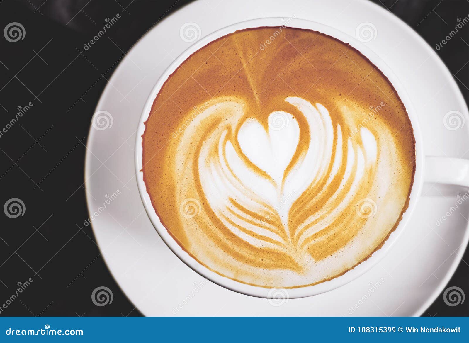 Heart symbol in coffee cup stock image. Image of espresso - 108315399