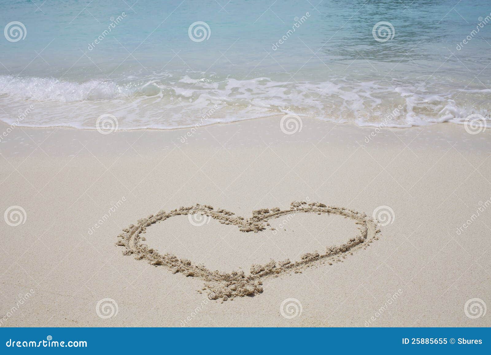 Heart Symbol on sand beach stock image. Image of tourism - 25885655
