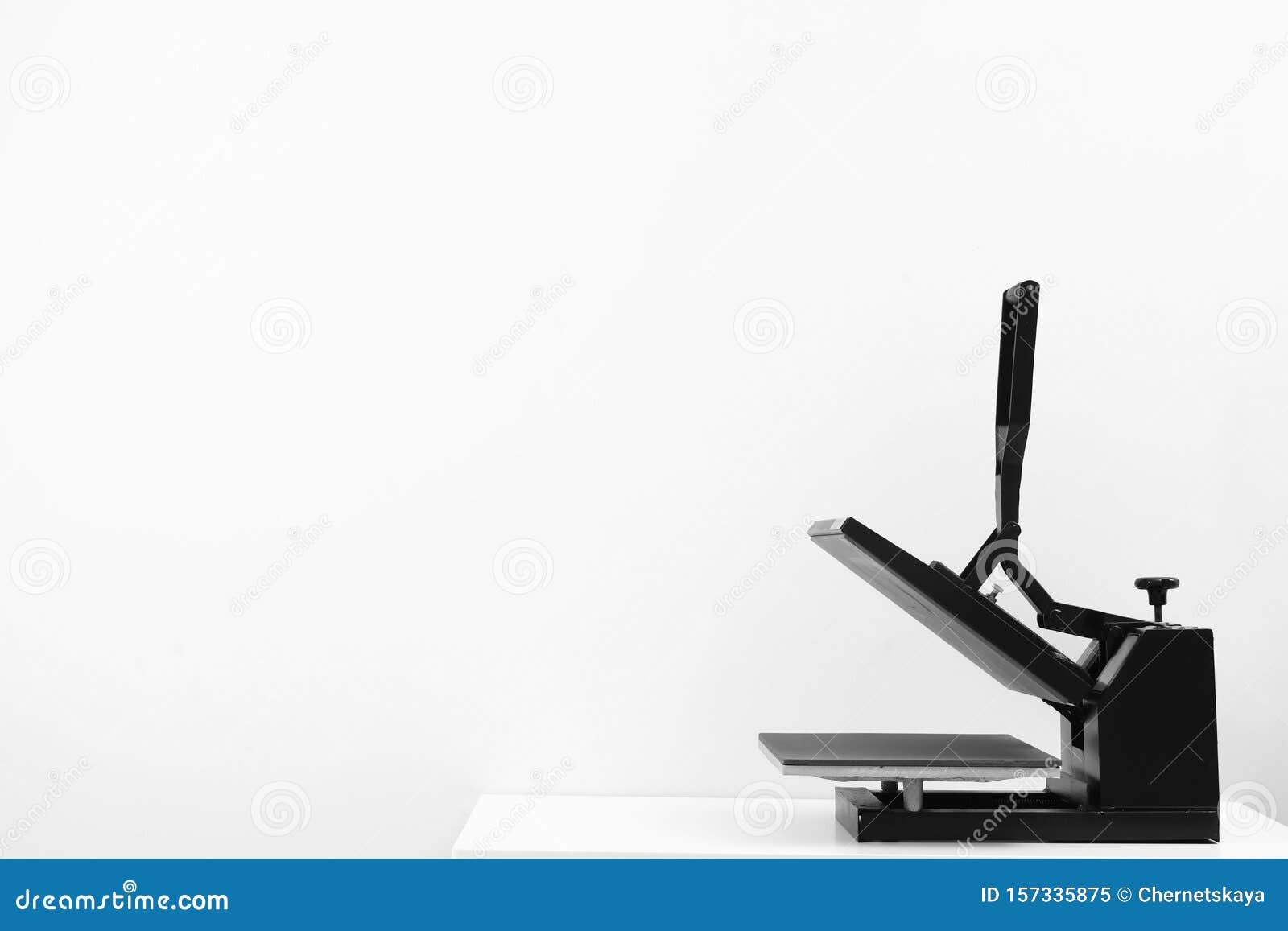 Heat Press Machine on Table Against Light Background Stock Image ...
