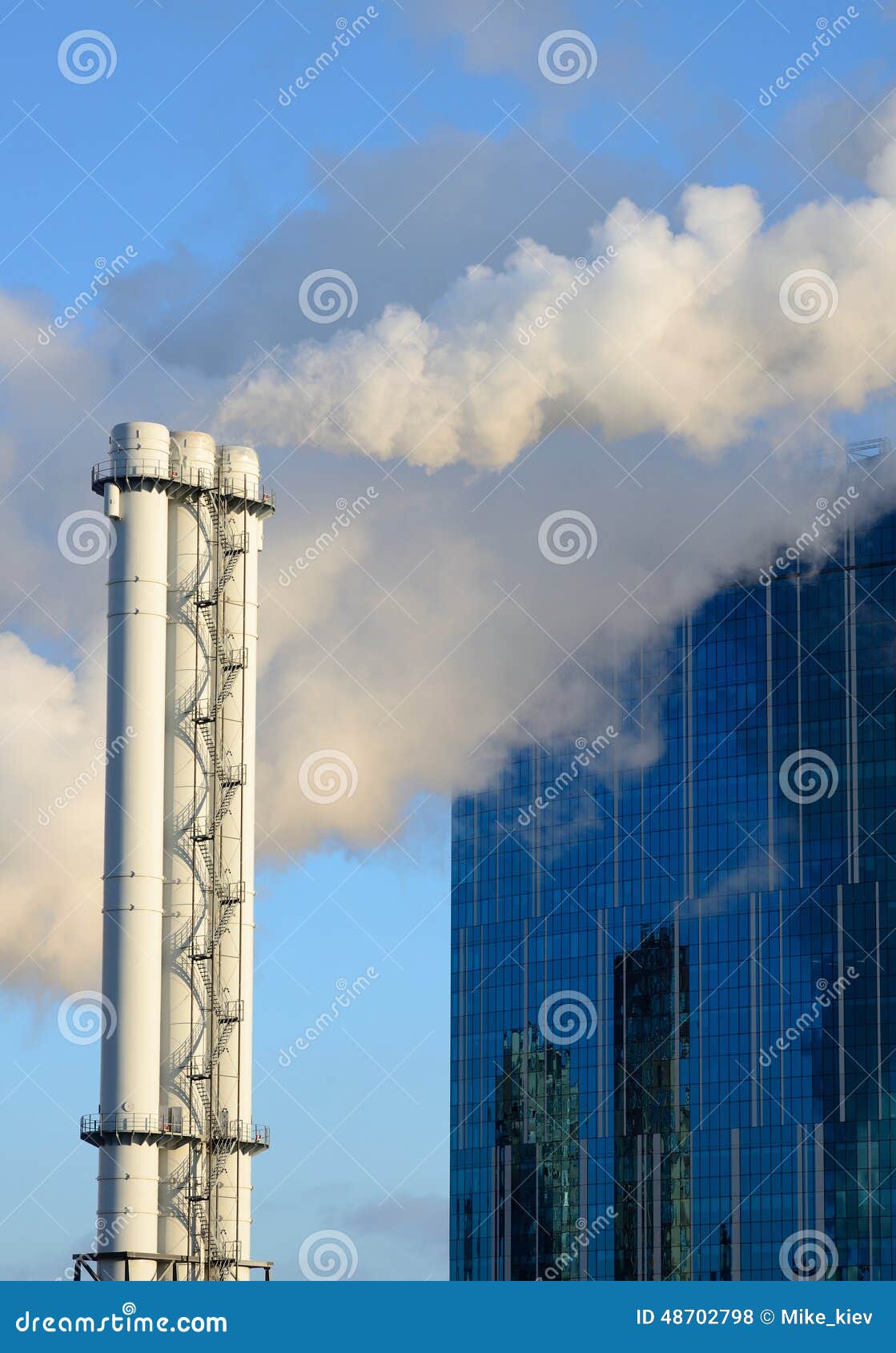 Heat Station Evaporator With A Metal Ladder Behind A Concrete Fence ...