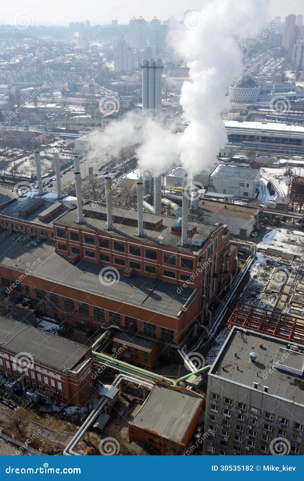 Heat Station Evaporator With A Metal Ladder Behind A Concrete Fence ...