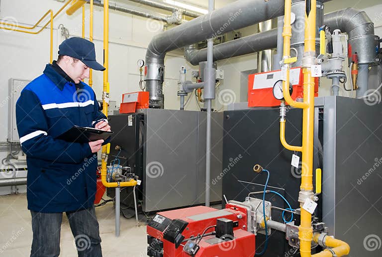 Heating Engineer in Boiler Room Stock Photo - Image of pipe, faucet ...