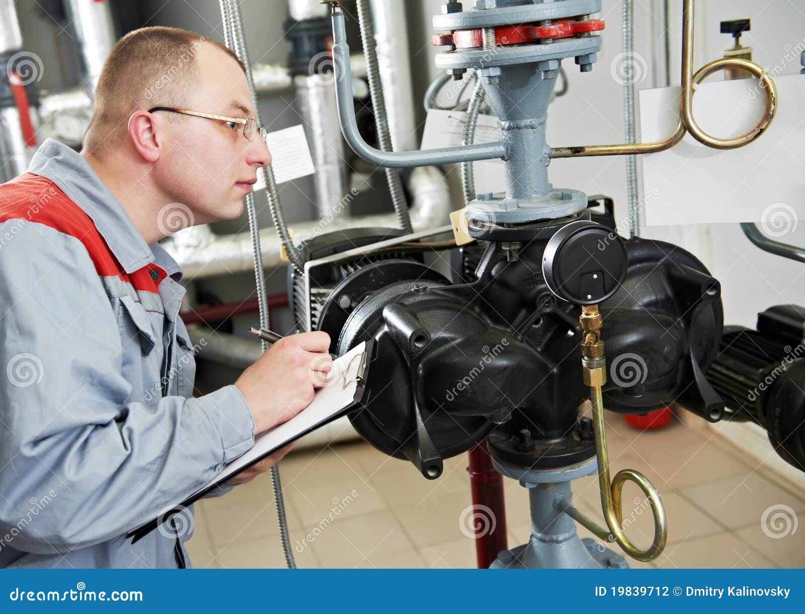 Heating Engineer in Boiler Room Stock Photo - Image of engineer, pipe ...