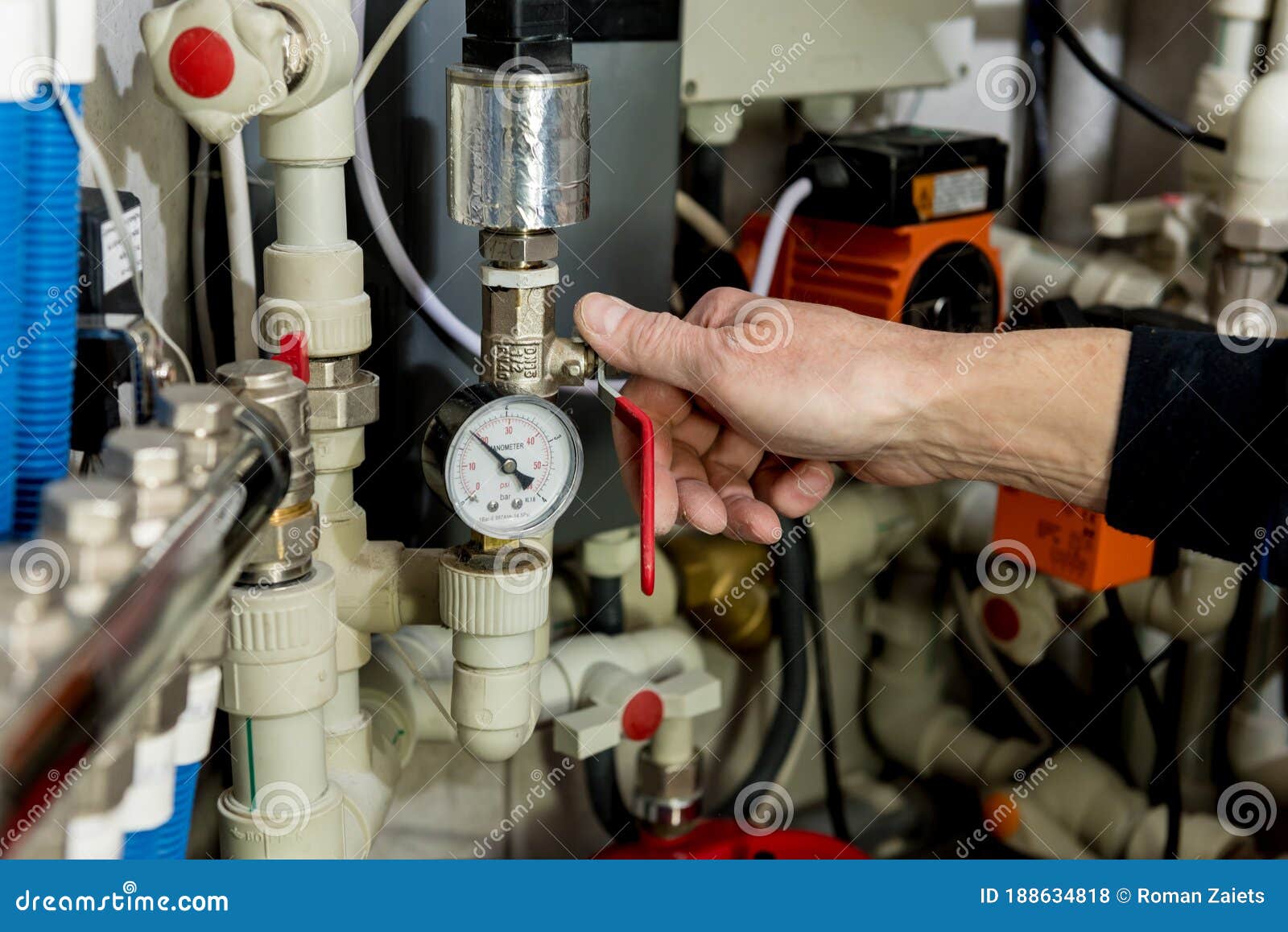 Heating Engineer Fixing Modern Heating System in Boiler Room. Stock ...