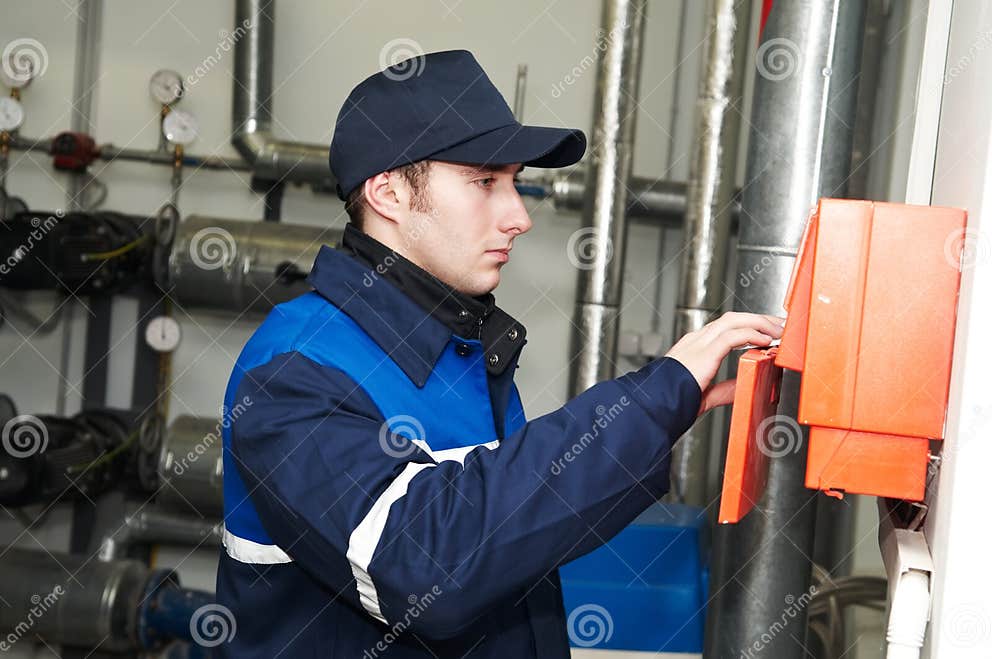 Heating engineer repairman stock image. Image of setting - 20180043