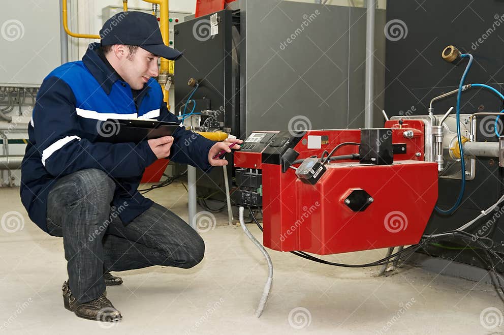 Heating Engineer Works with Boiler Stock Image - Image of examining ...