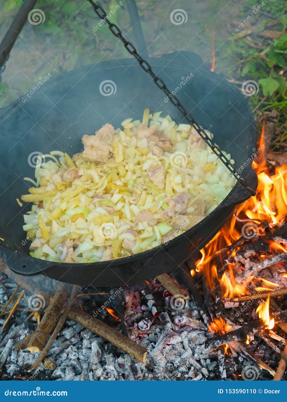 Heating Kettle with Food on Fire. Beginning Cooking Stock Photo - Image ...
