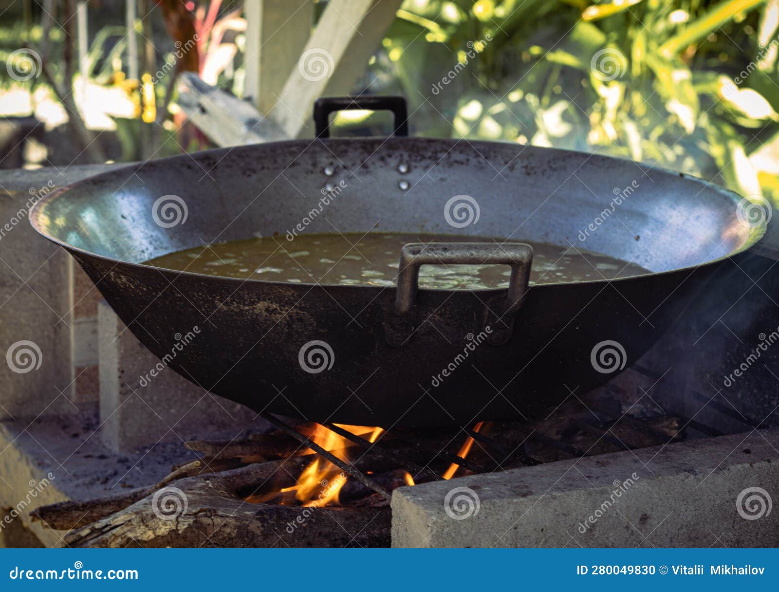 Heating Over an Open Fire of Water in a Large Cauldron! Stock Photo ...