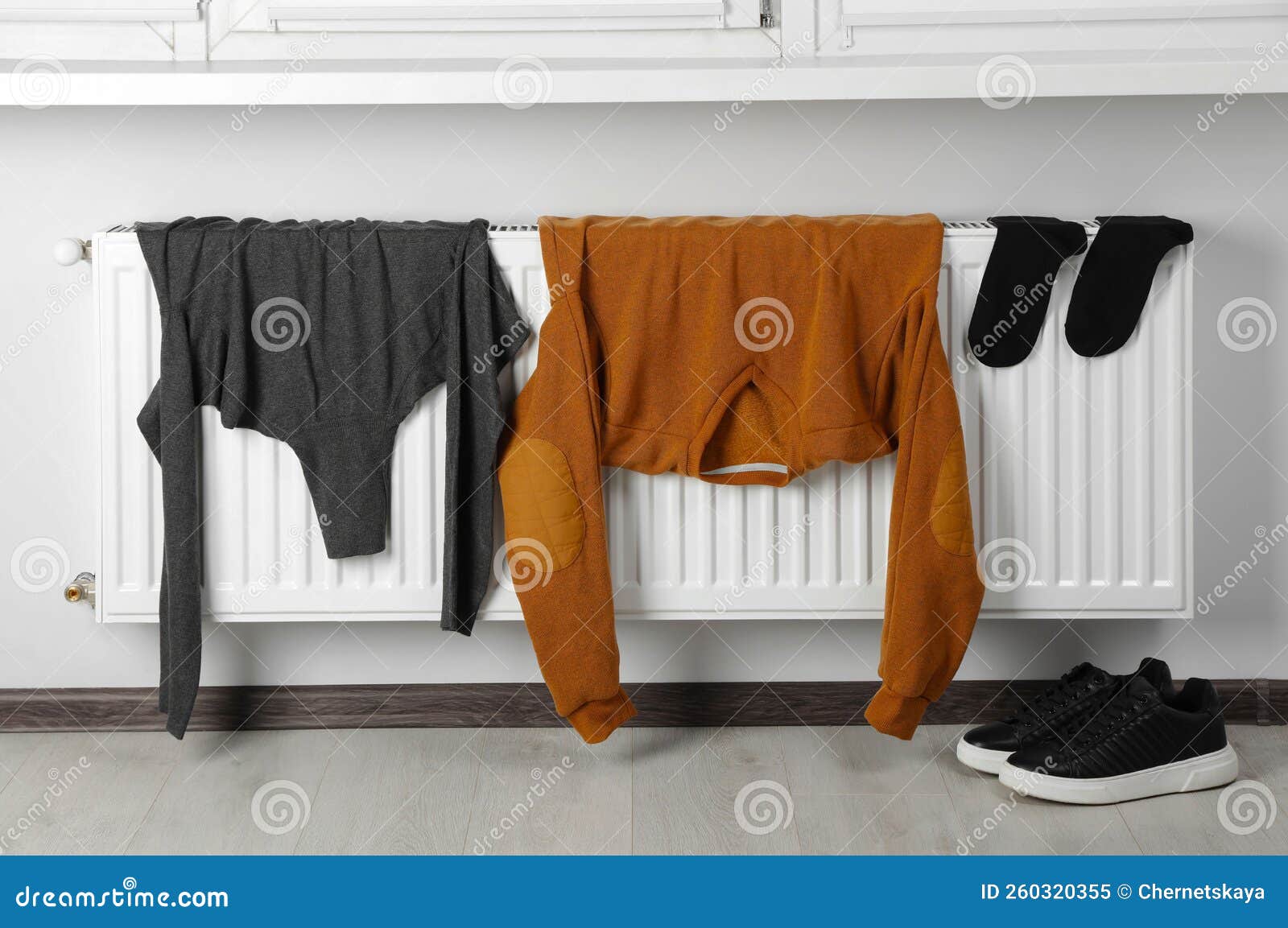 Heating Radiator with Clothes and Shoes in Room Stock Illustration ...