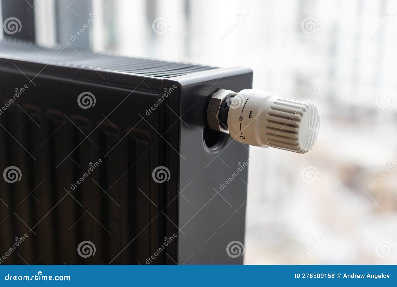 Heating Radiator in Room with Laminated Wooden Floor Stock Photo ...