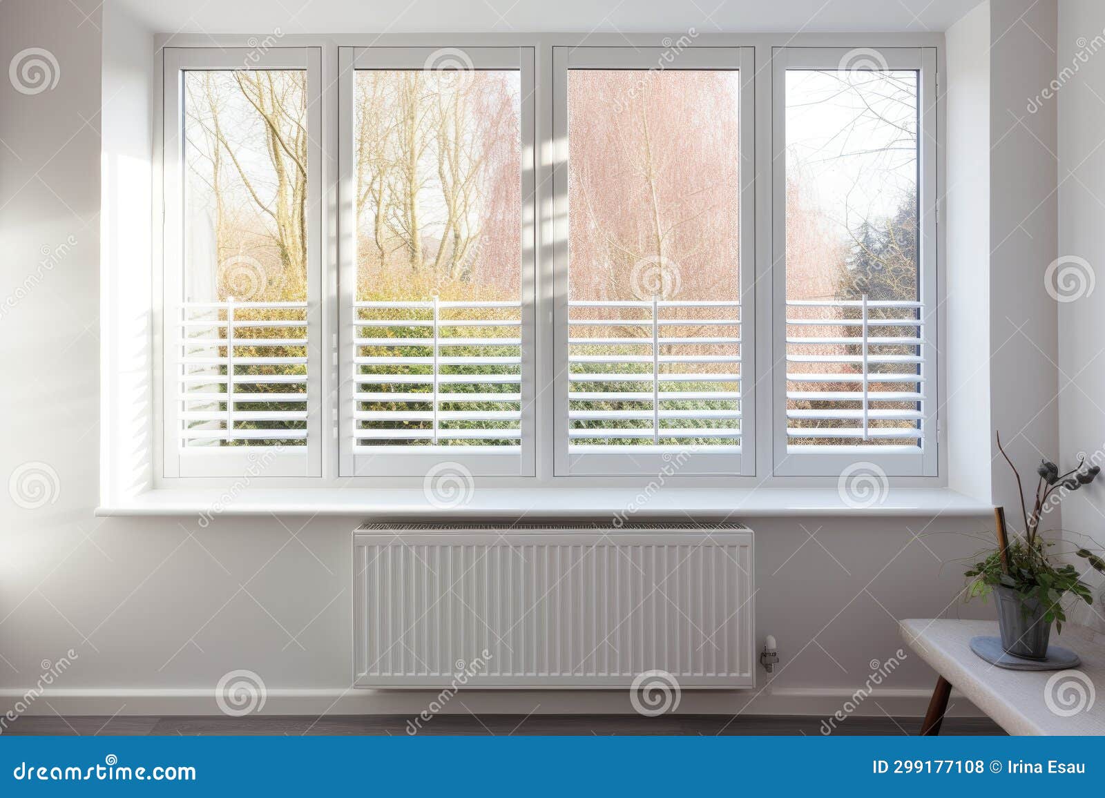Heating Radiator Under the Window with Plants Stock Photo - Image of ...