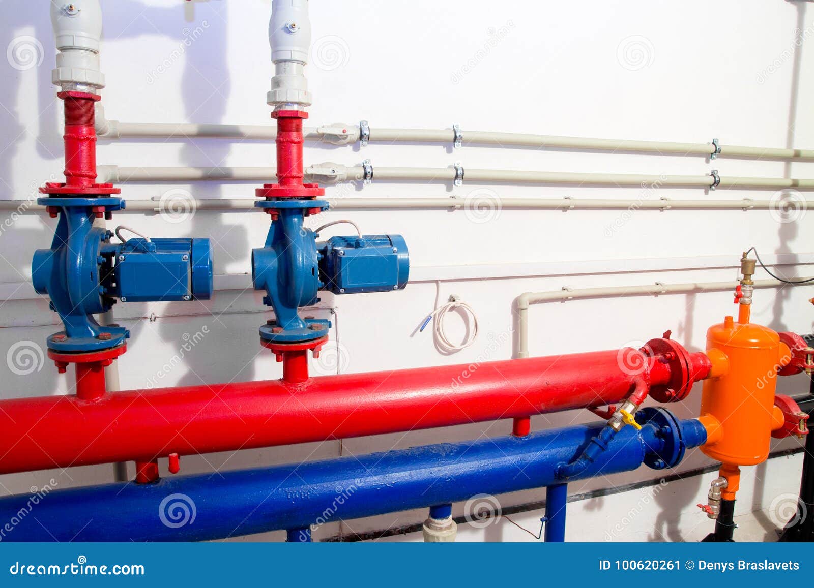 Heating System In A Boiler Room. Powerful Pumps Red And Blue Tubes Pipe ...