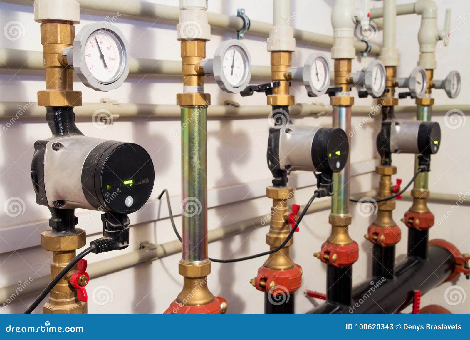 Heating System in a Boiler Room. Powerful Pumps Red and Blue Tubes Pipe ...