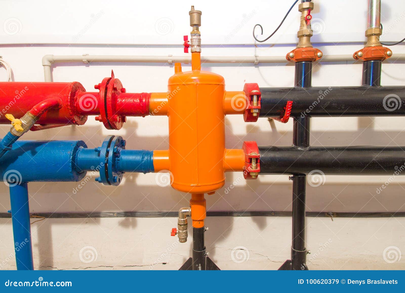 Heating System in a Boiler Room. Powerful Pumps Red and Blue Tubes Pipe ...