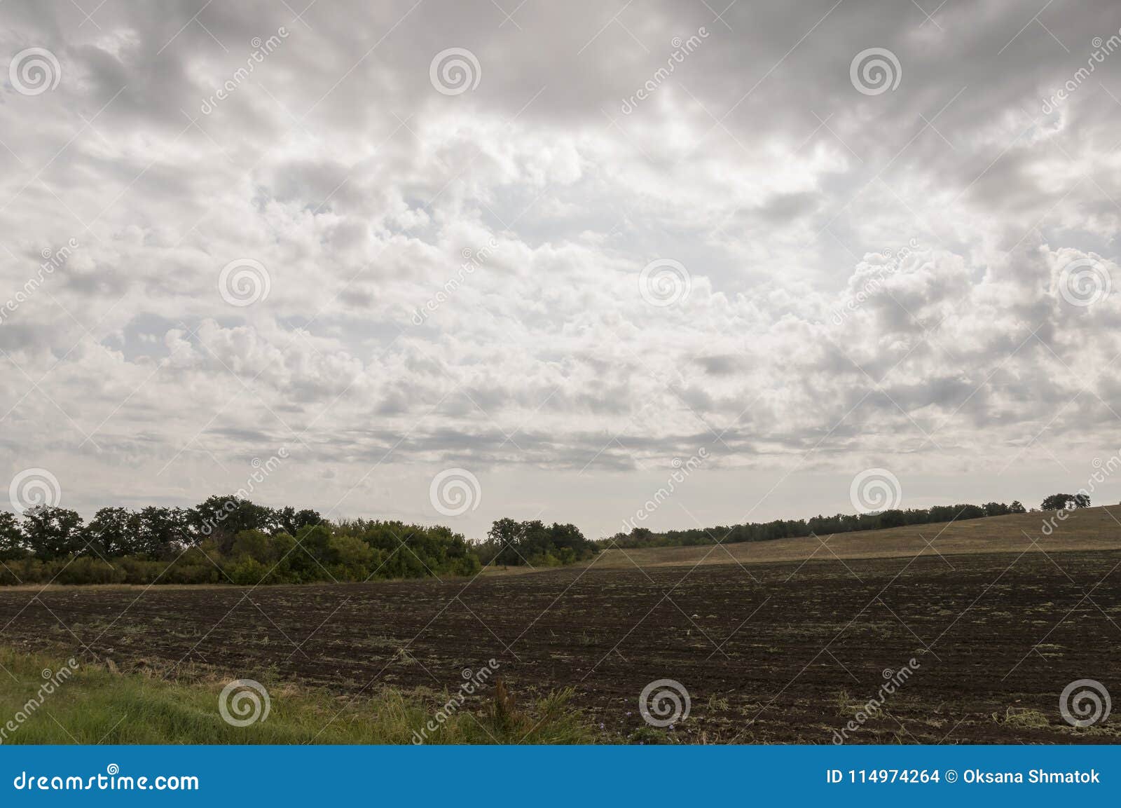 Heavy Big Grey Clouds in the Cold Autumn Sky Over Fields, Forests and ...