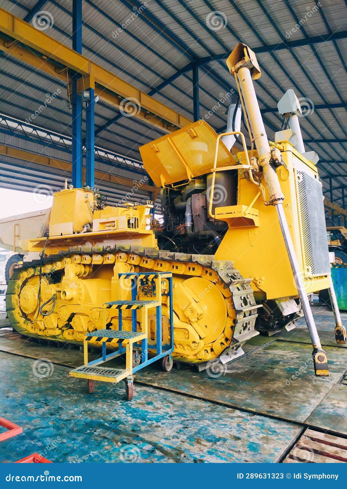 A Heavy Bulldozer is Parked at the Workshop for Maintenance Stock Image ...