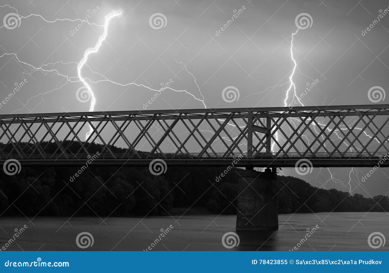 Heavy Clouds Bringing Thunder, Lightnings and Storm Over Bridge Stock ...
