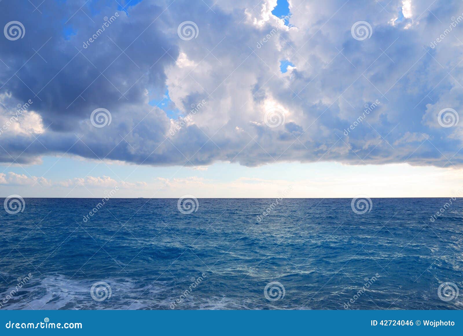Heavy Clouds and Vast Deep Blue Sea Stock Photo - Image of environment ...