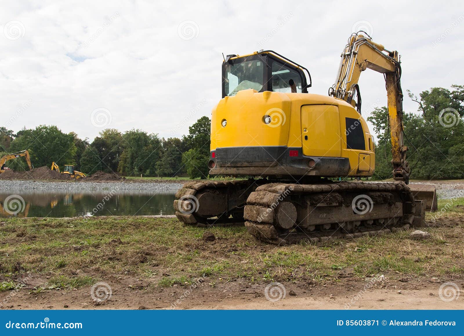 Heavy Construction Equipment. Yellow Excavator on the Construction Site ...