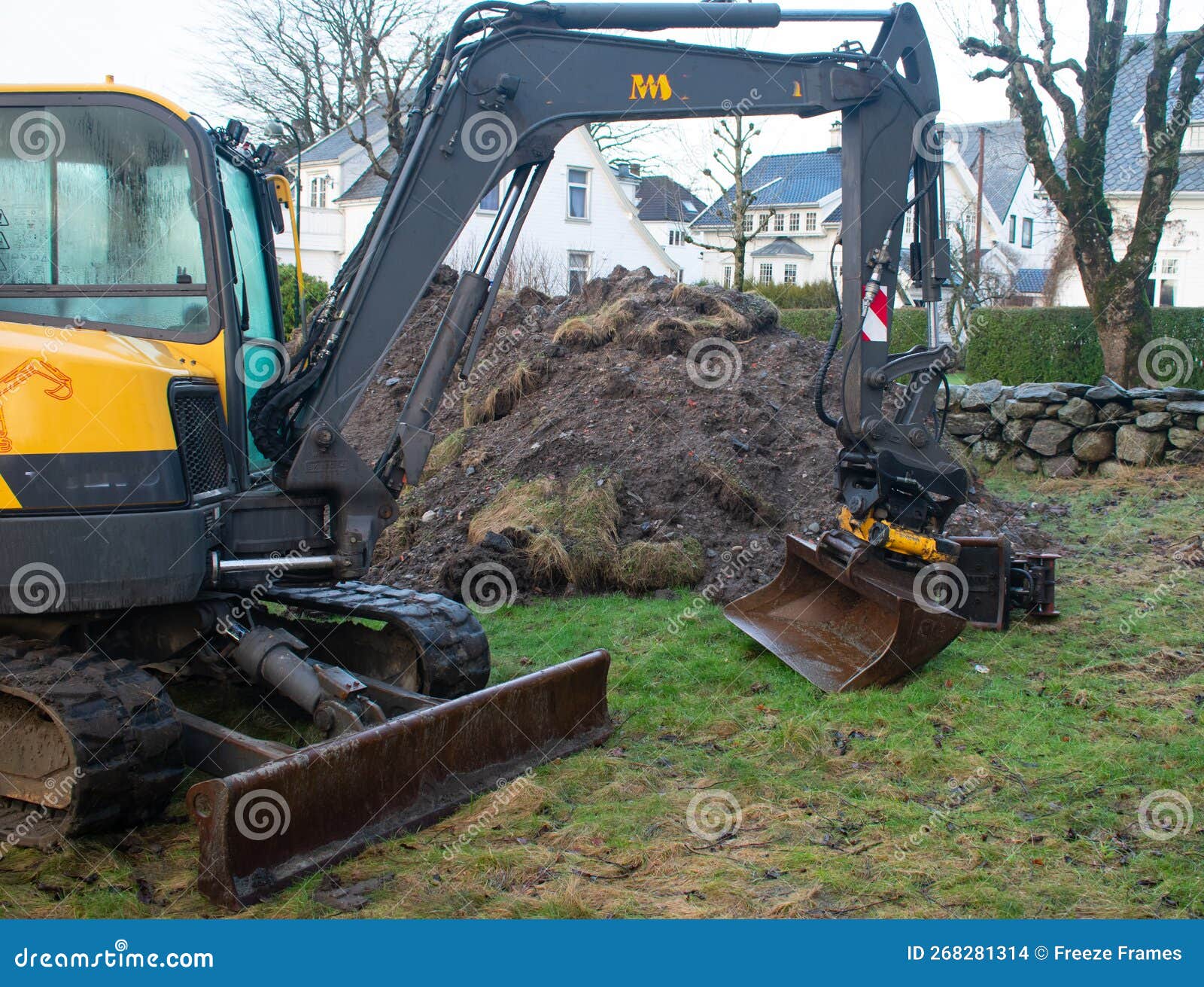 Heavy Construction Machinery (Backhoe) Working on Local Park Stock ...