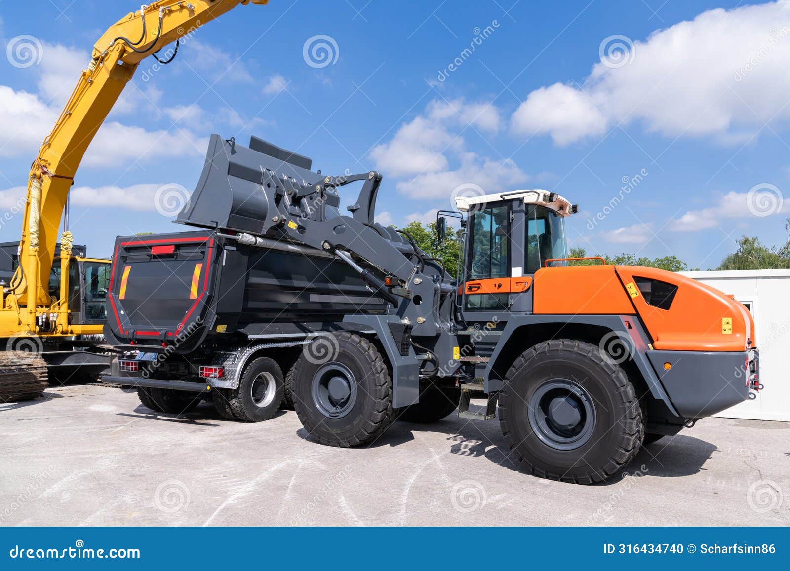 Heavy Construction Machines during a Work. Stock Photo - Image of ...