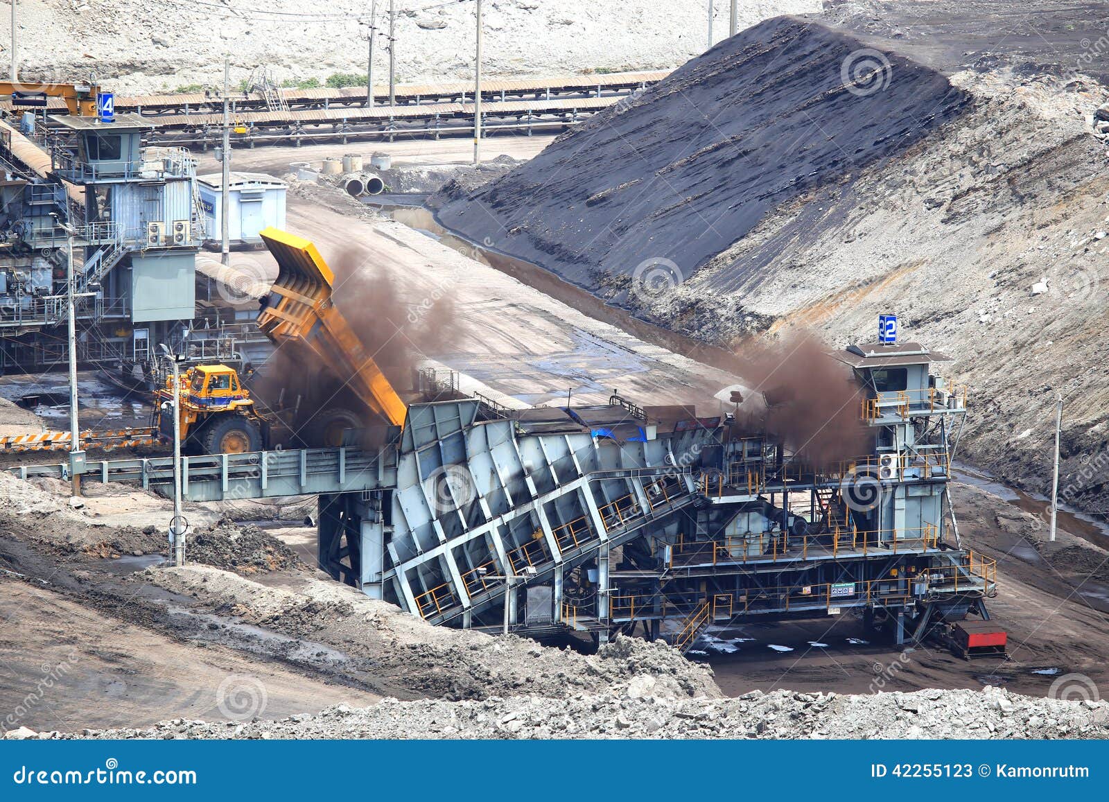 Heavy Construction Tipper Trucks Dump Coal To the Conveyor Stock Image ...