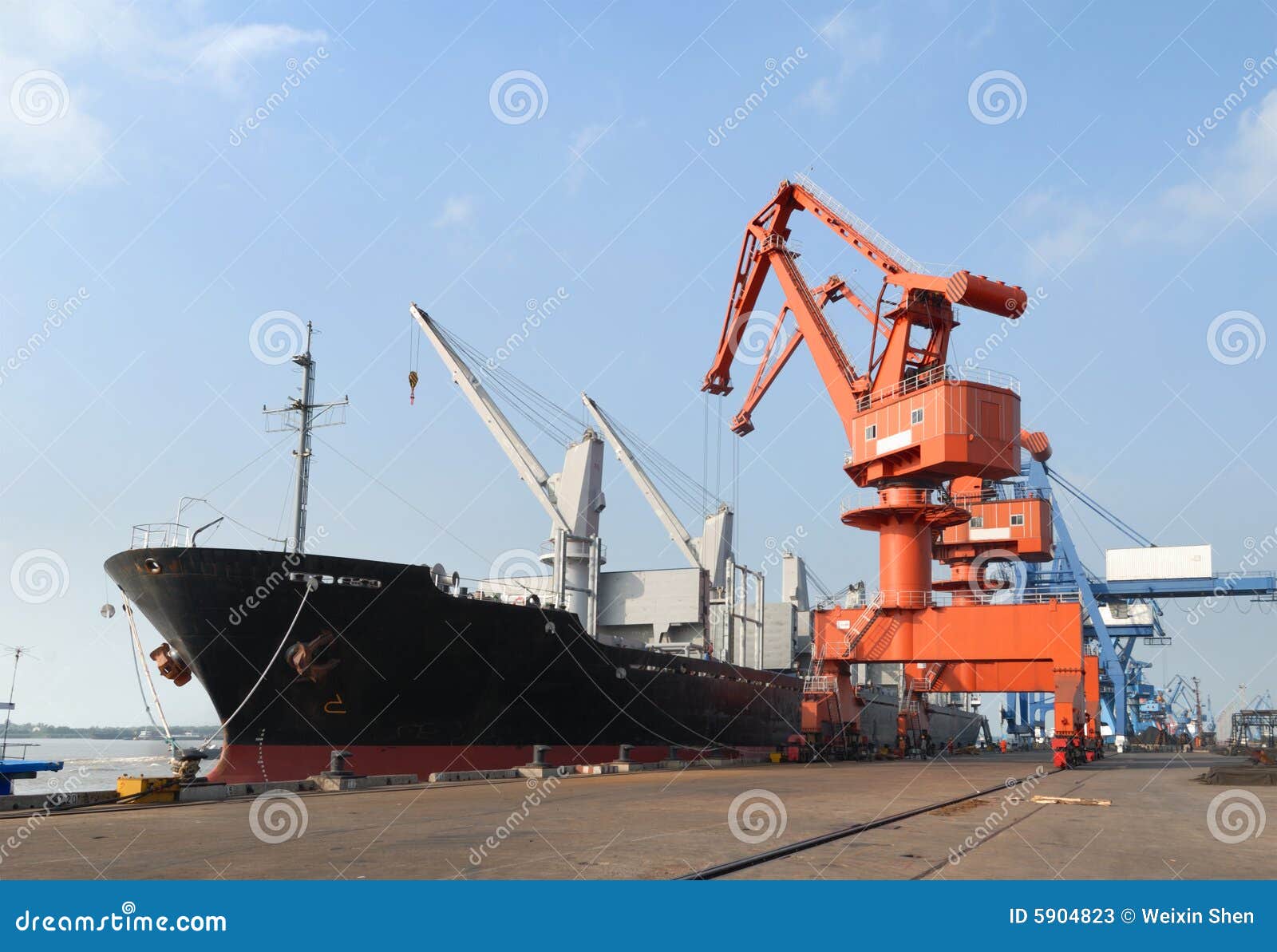 Heavy cranes in the harbor stock image. Image of lift - 5904823