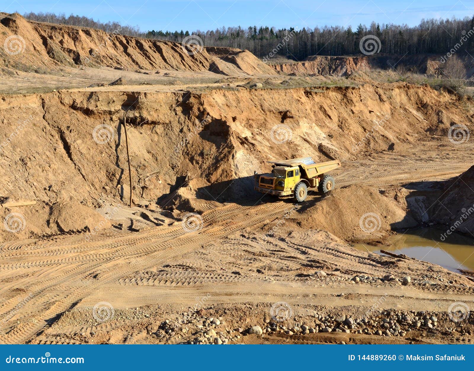 Heavy Dump Truck Working in a Sand Pit Stock Photo - Image of large ...