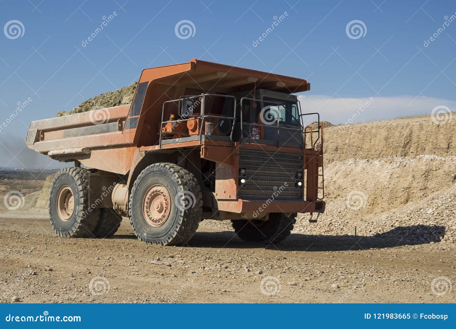 Heavy Dumper Truck Working On A Construction Site Royalty-Free Stock ...