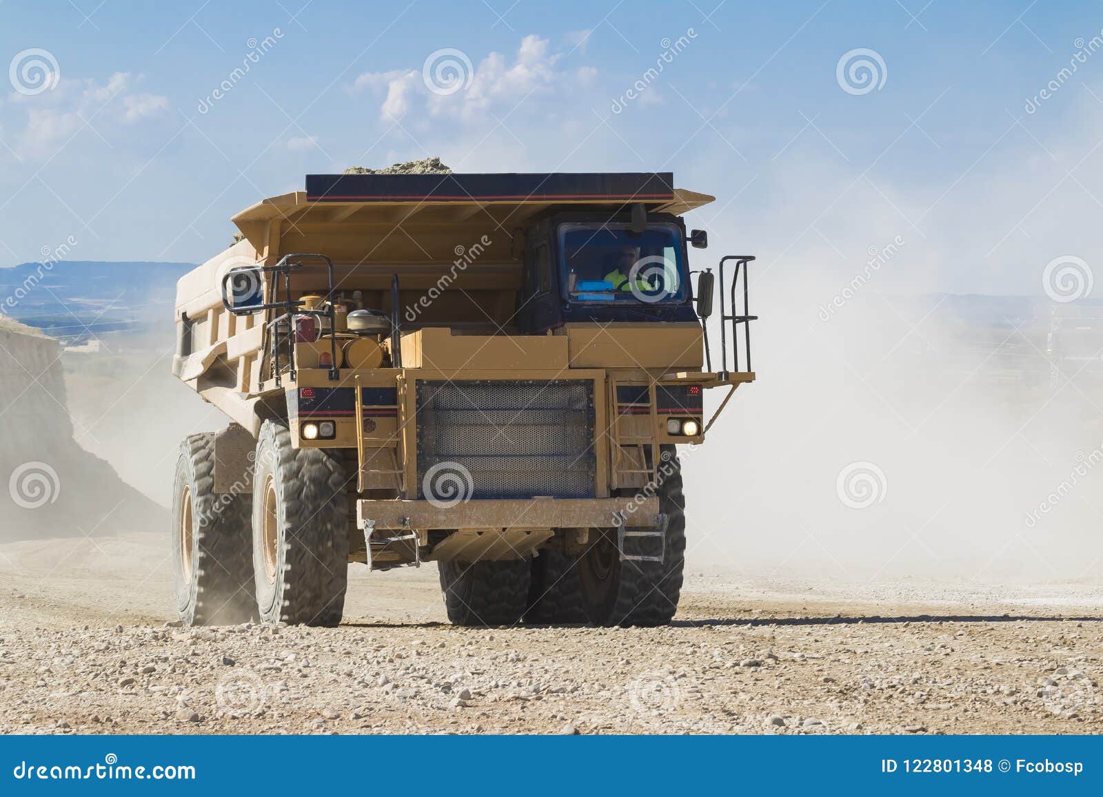 Heavy Dumper Truck Working on a Construction Site Stock Photo - Image ...