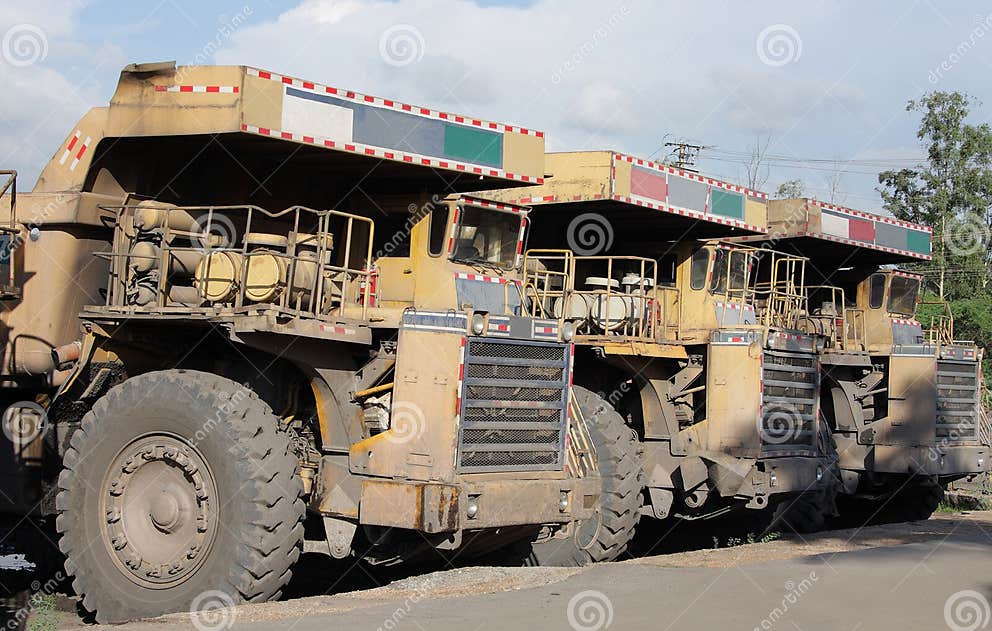 Heavy Duty Coal Dumpers in a Row Stock Photo - Image of opencast ...