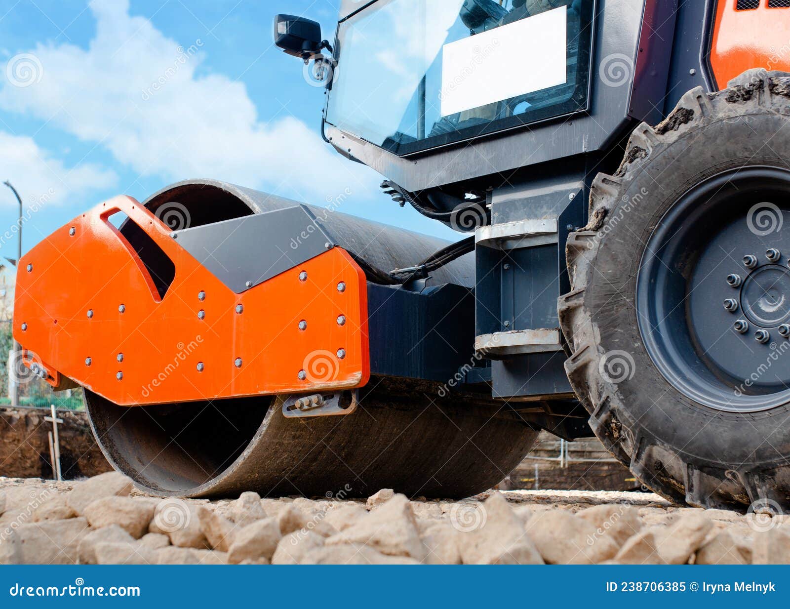 Heavy Duty Road Vibrating Roller Compacting Stone during New Road ...