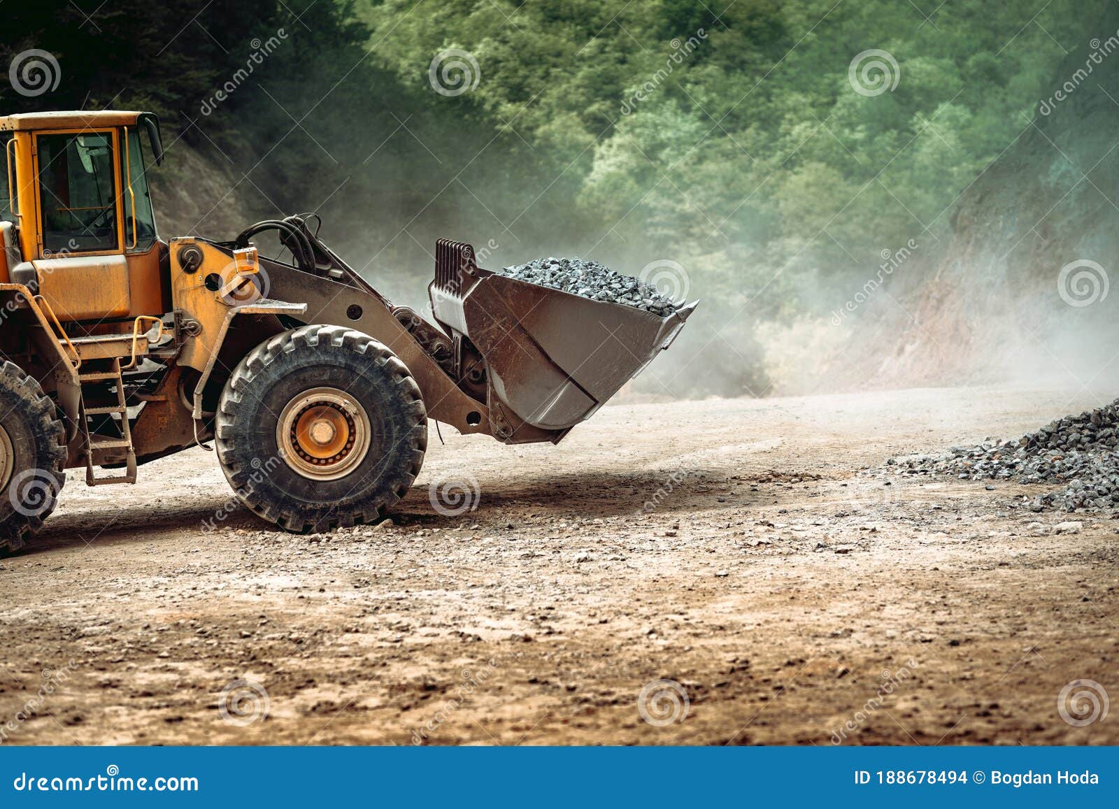 Heavy Duty Industrial Wheel Loader Loading Granite Rock and Ore at ...