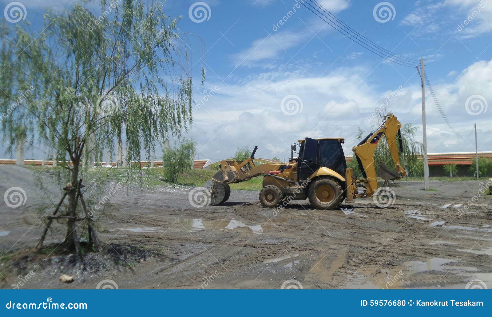 Heavy Equipment Backhoe in Construction Site Under Blue Sky Stock Photo ...