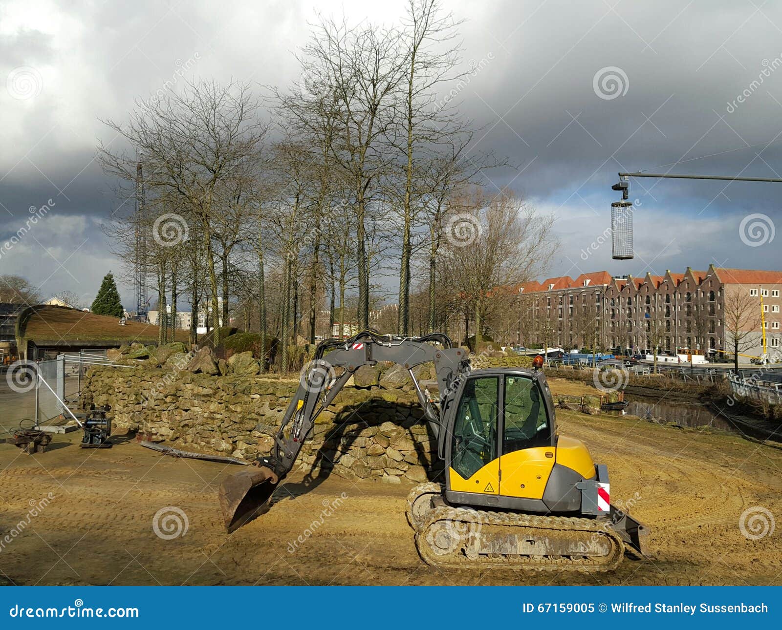 Heavy Equipment at Construction Site Stock Image - Image of storm, grey ...