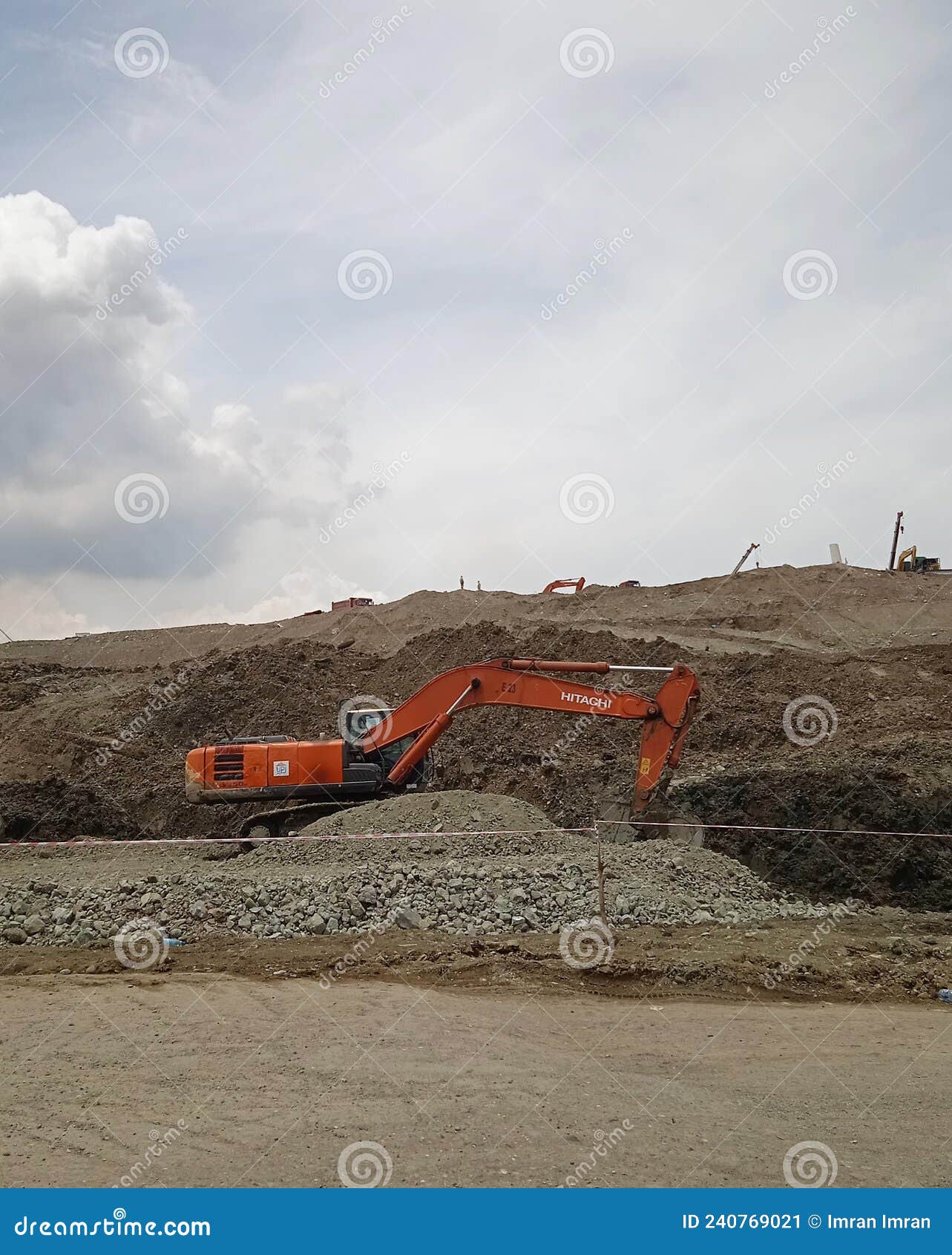 Heavy Equipment Excavator is Digging the Ground by the Roadside White ...