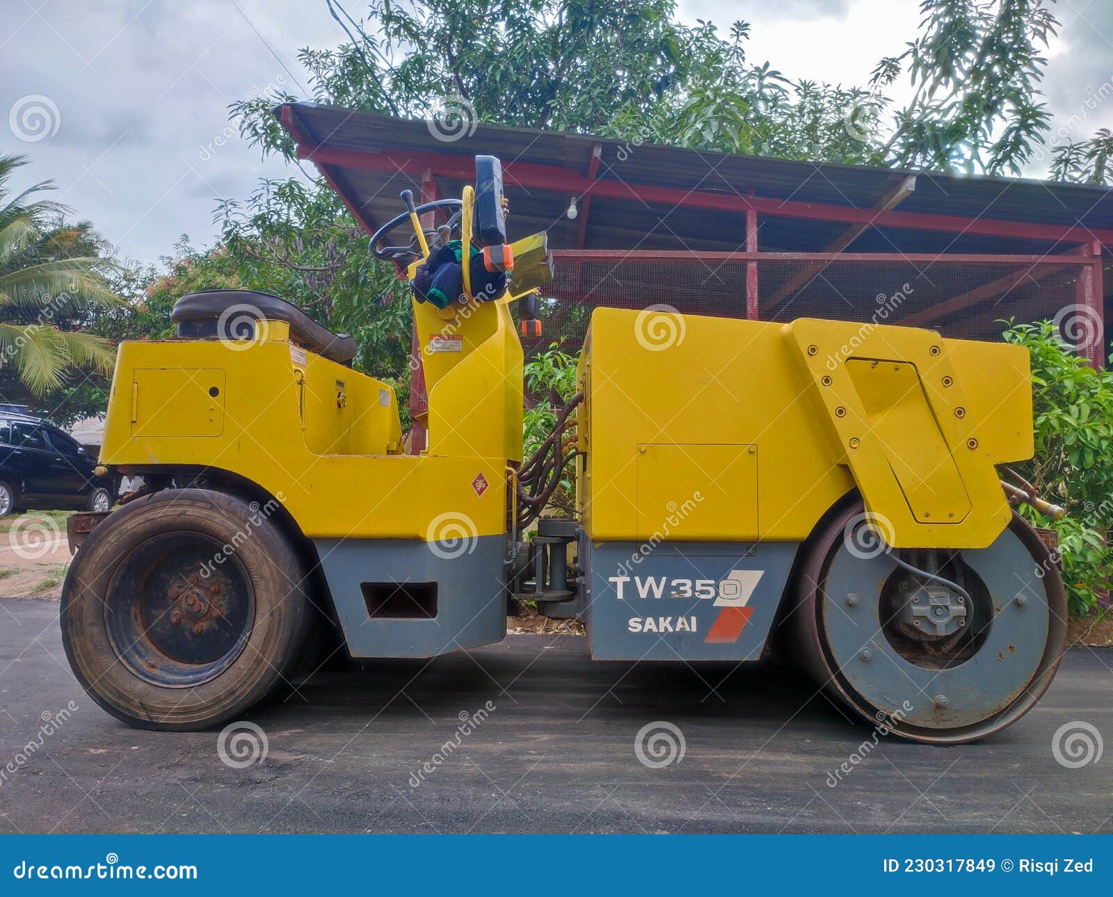 Heavy Equipment that Functions As a Compactor with a Combination Wheel ...