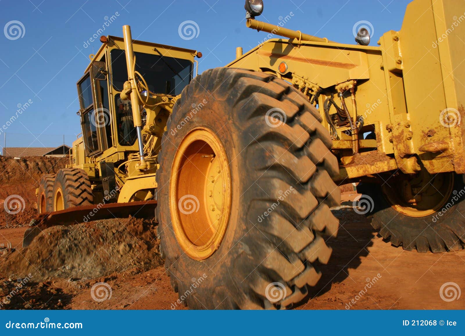 Heavy Equipment Scraping a Road Stock Photo - Image of worker, building ...