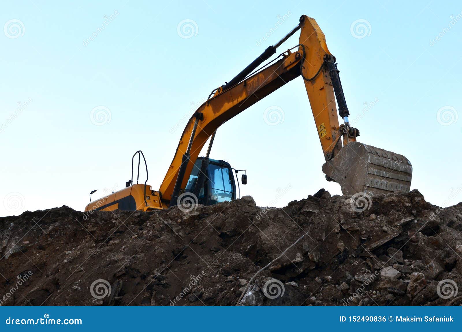 Heavy Excavator Working at Construction Site. Stock Photo - Image of ...
