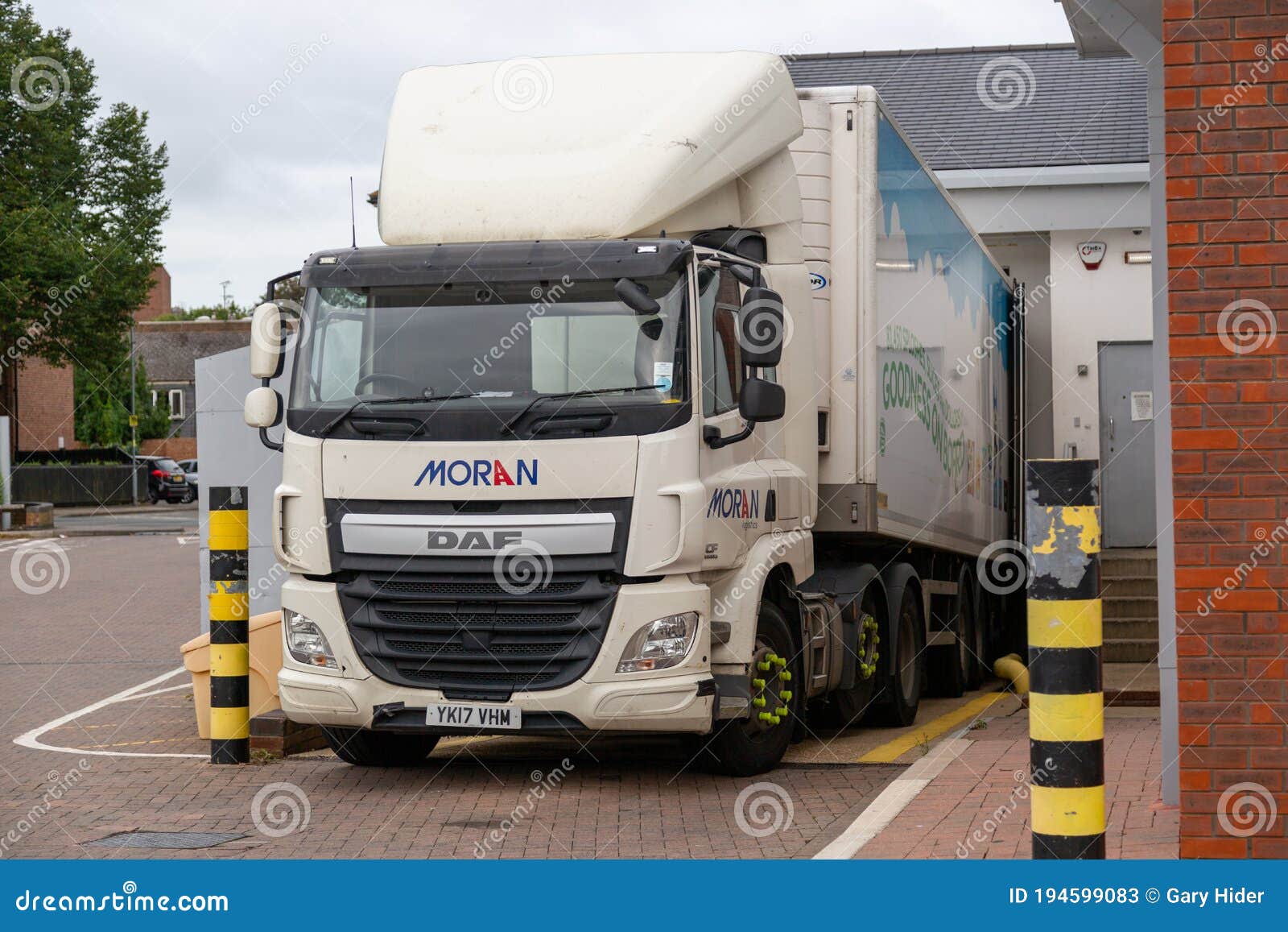 A Heavy Goods Lorry Unloading in a Lorry Loading Bay Editorial Stock ...