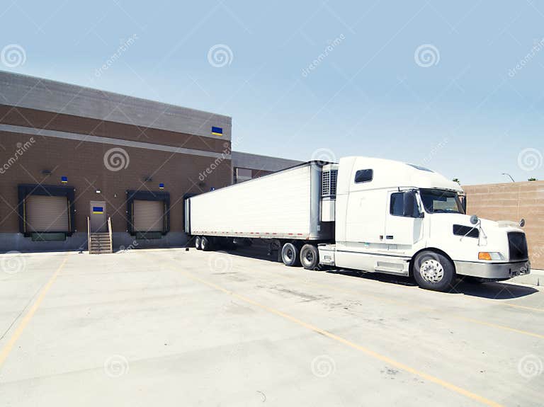 Heavy Goods Truck Loading at Warehouse Stock Photo - Image of travel ...