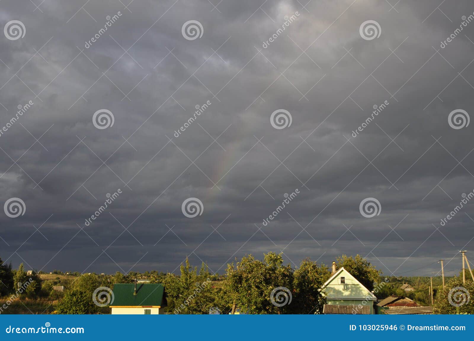 Disappearing Rainbow after the Storm Stock Photo - Image of garden ...