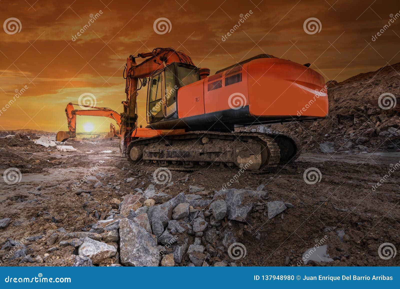 Heavy Hydraulic Machinery in Construction Works at Dawn Stock Photo ...