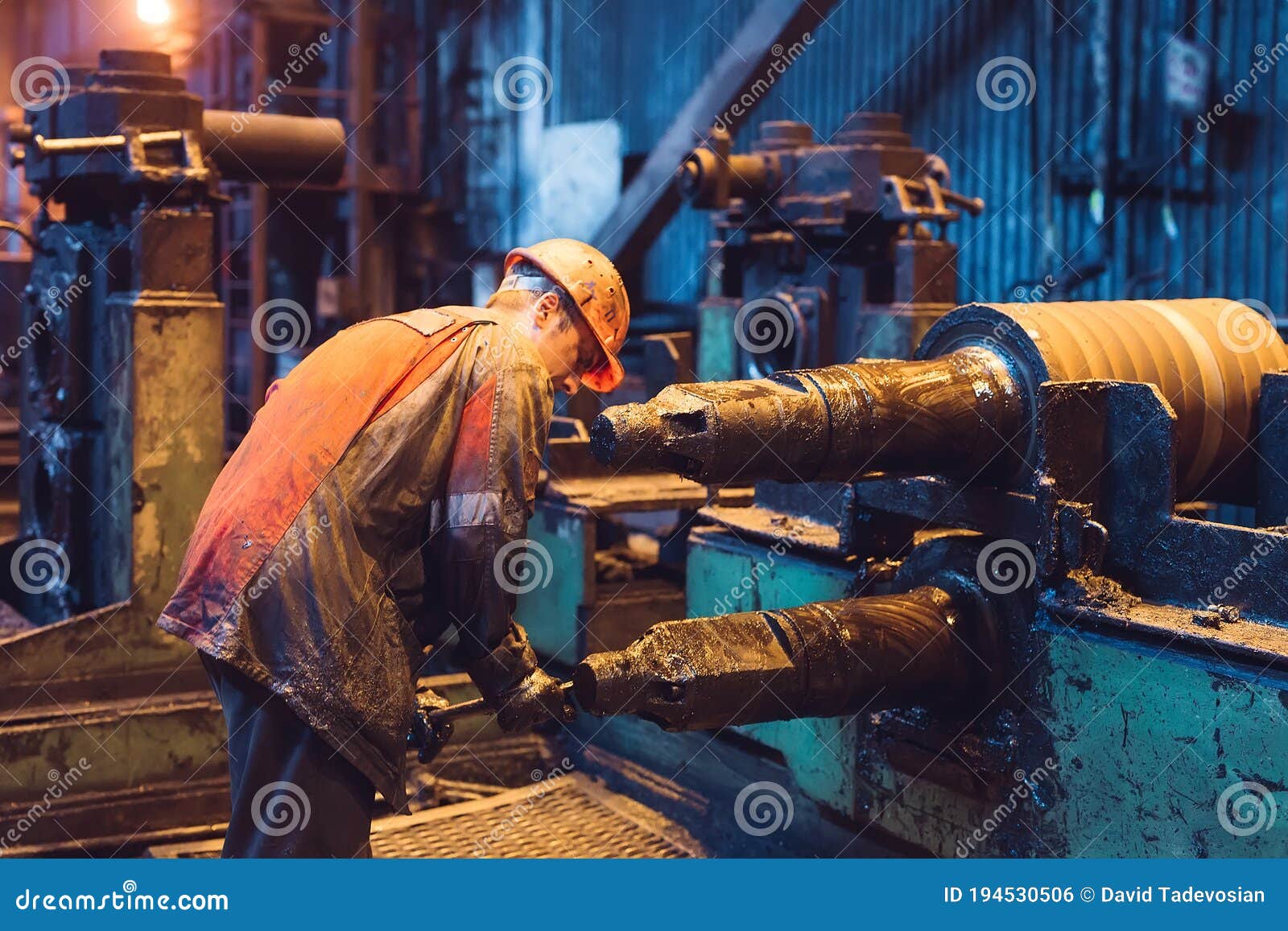 Heavy Industry Worker Working Machine. Rough Industrial Environment ...