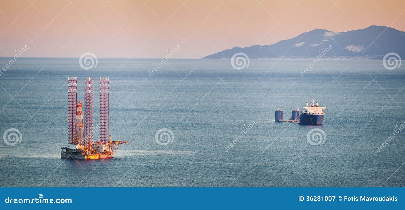 Heavy Lift Cargo Ship and a Jack Up Rig Stock Image - Image of import ...