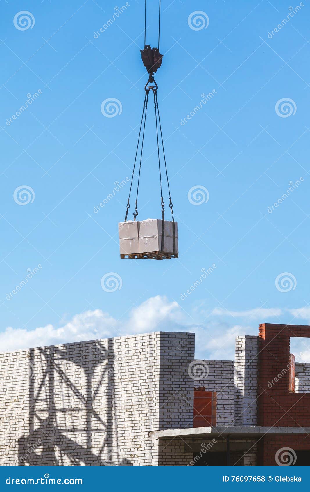 Heavy Load Hanging on Construction Site of Brick Building Stock Photo ...